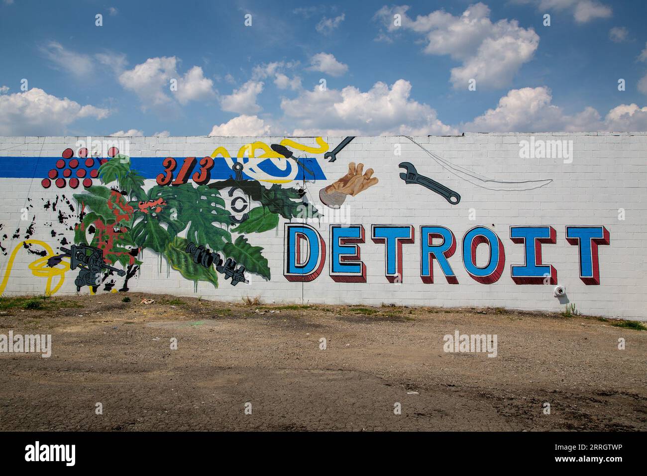 A mural letter painting of Detroit on the wall of a autoshop in Detroit ...