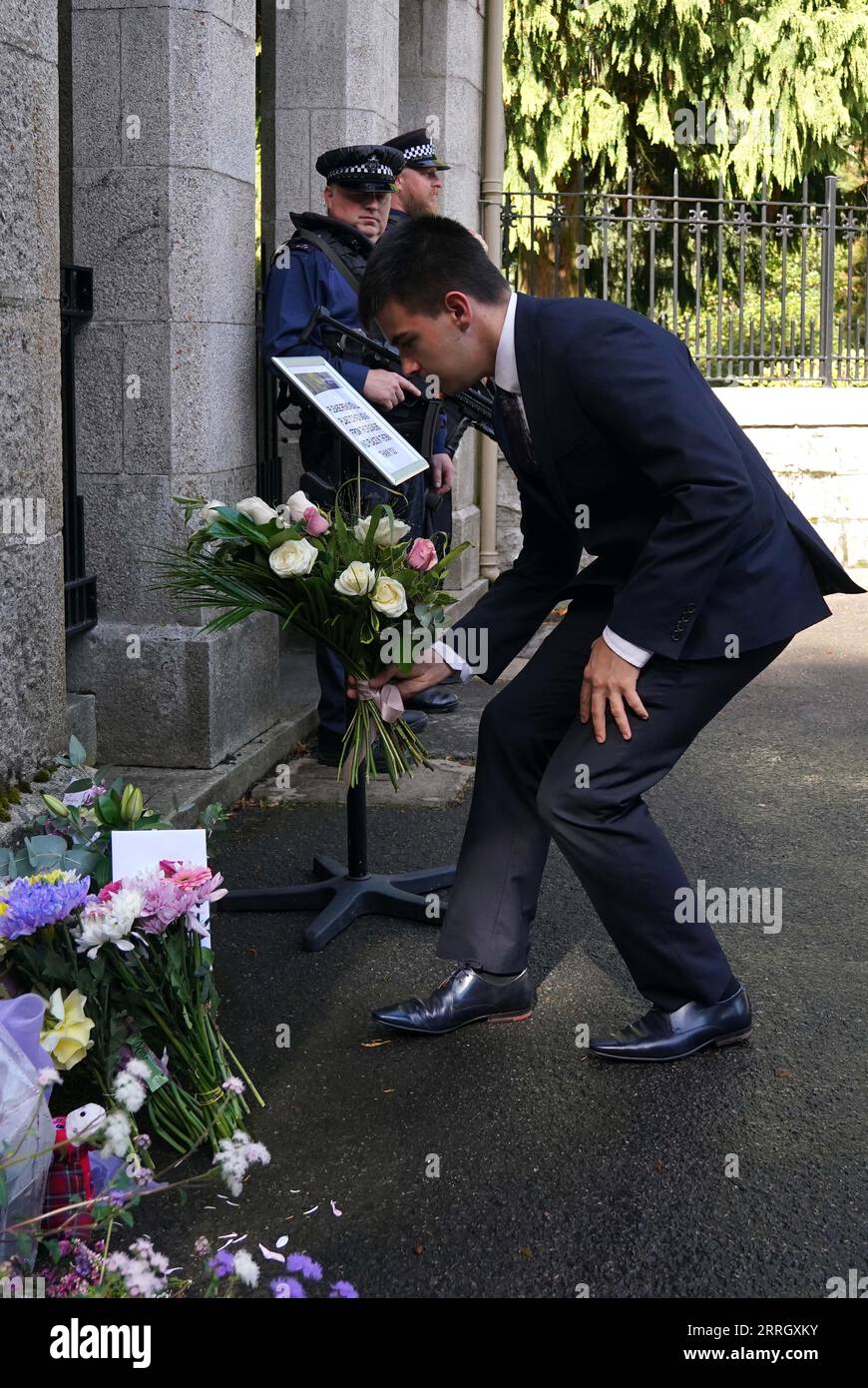 Kai Suleman MSYP for Aberdeenshire West leaves flowers at the gates of ...