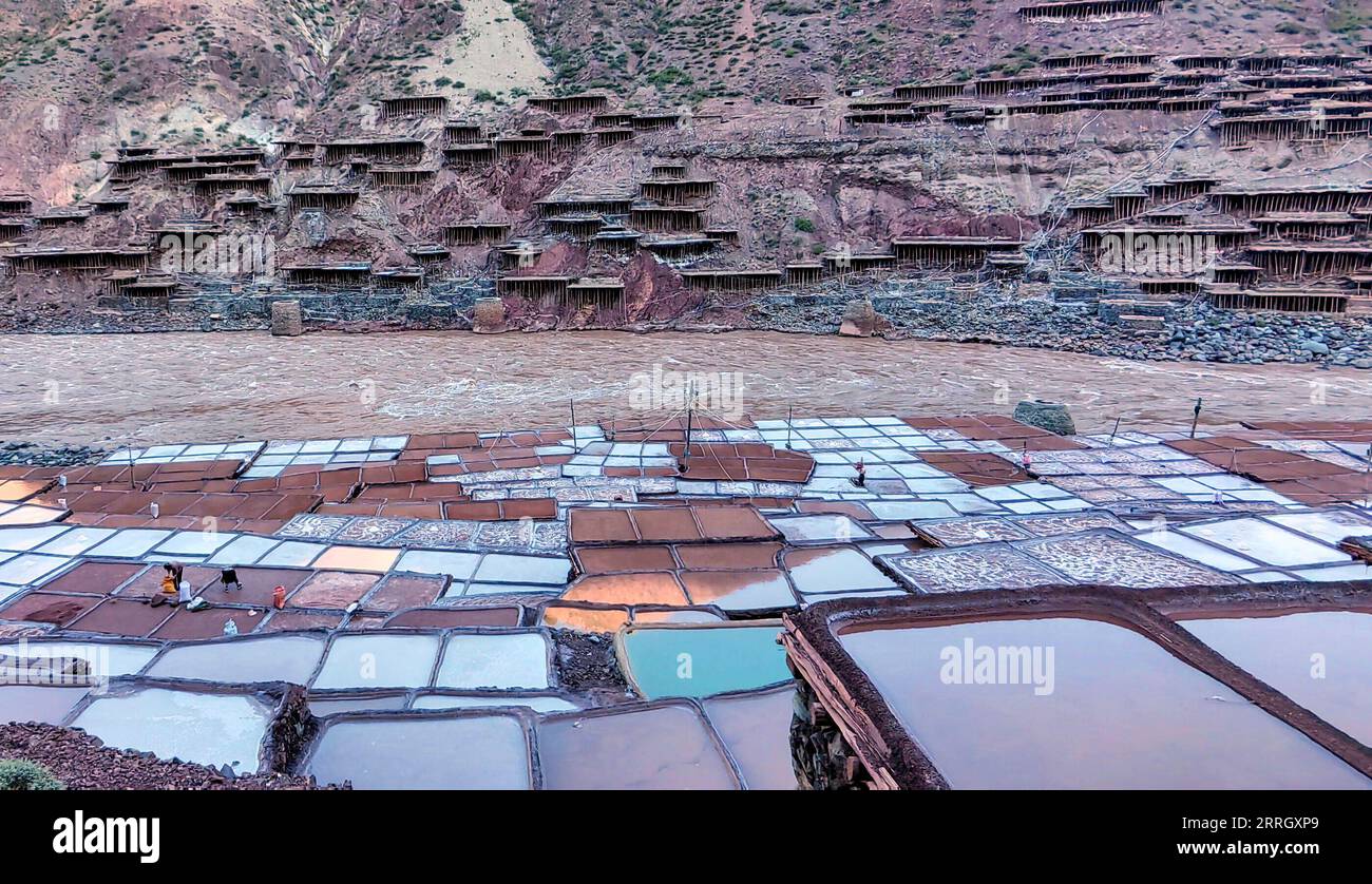 Collecting salt from salt pan hi-res stock photography and images - Alamy