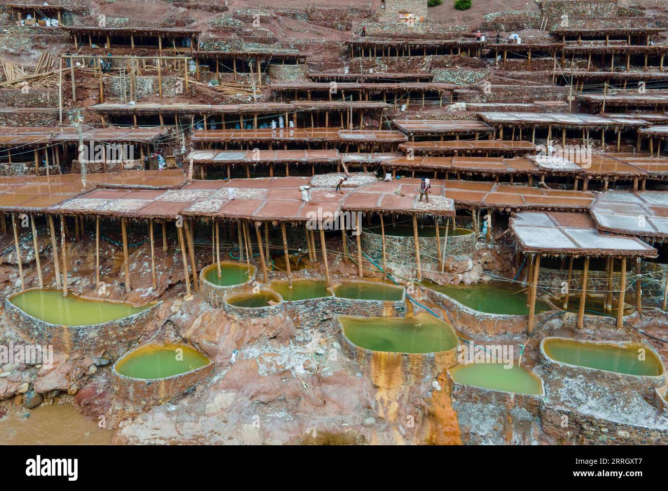 Collecting salt from salt pan hi-res stock photography and images - Alamy