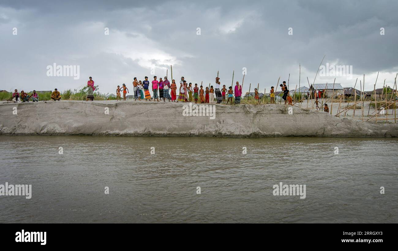 The villagers on the Kheyar Alga char on the Brahmaputra River. The ...