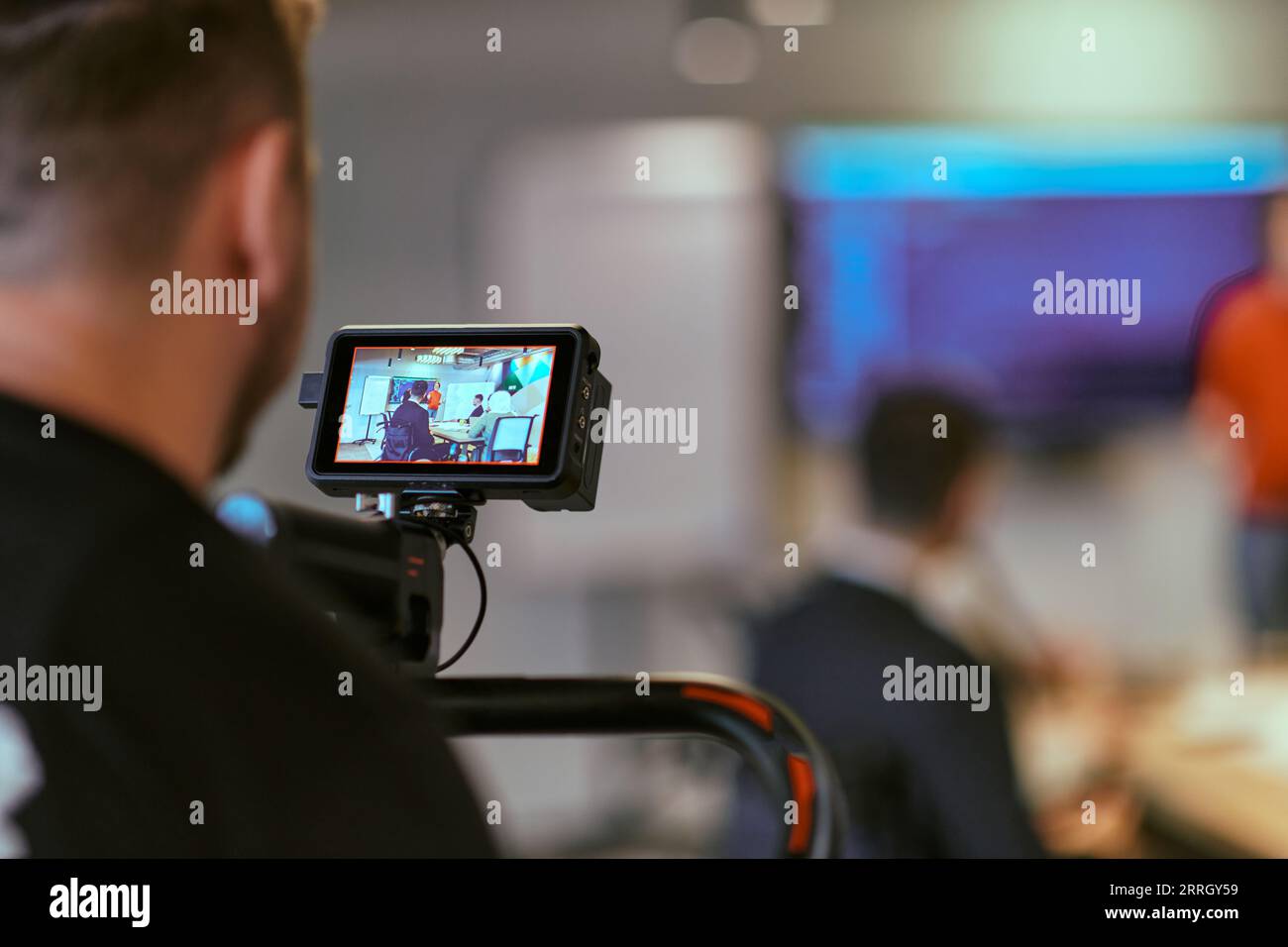 Filming tv behind lens hi-res stock photography and images - Alamy