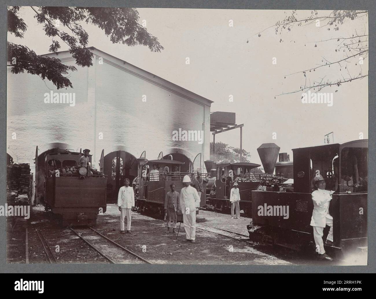 Locomotives at the factory building or station at the sugar factory ...
