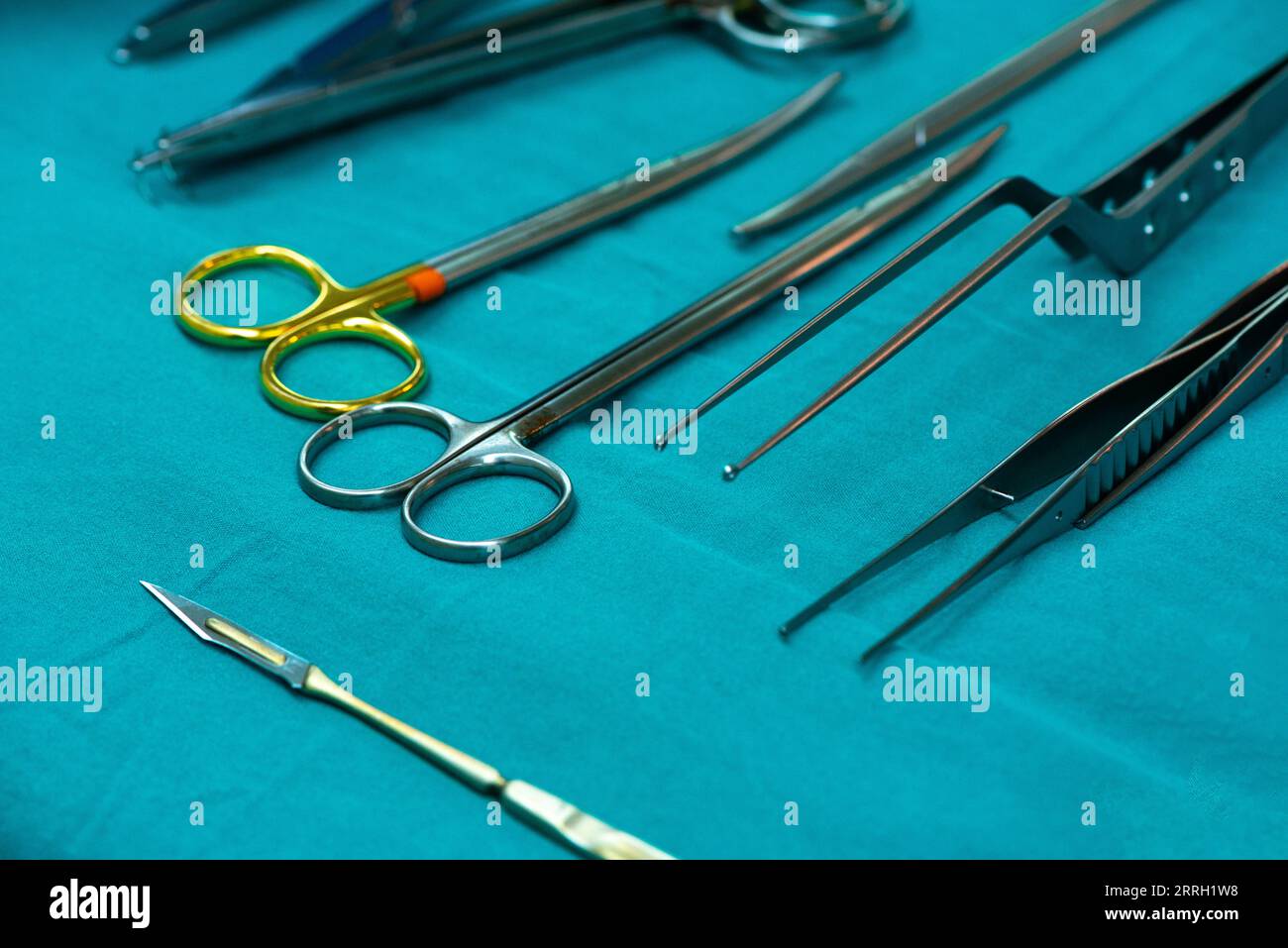 Surgical blade and group of surgical instruments on the table in ...