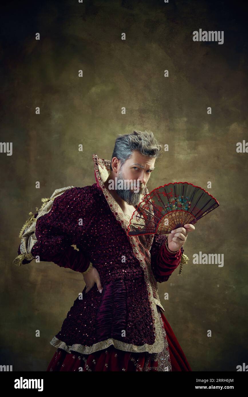 Monarch's wardrobe. Serious medieval nobleman, royal person, king in ...