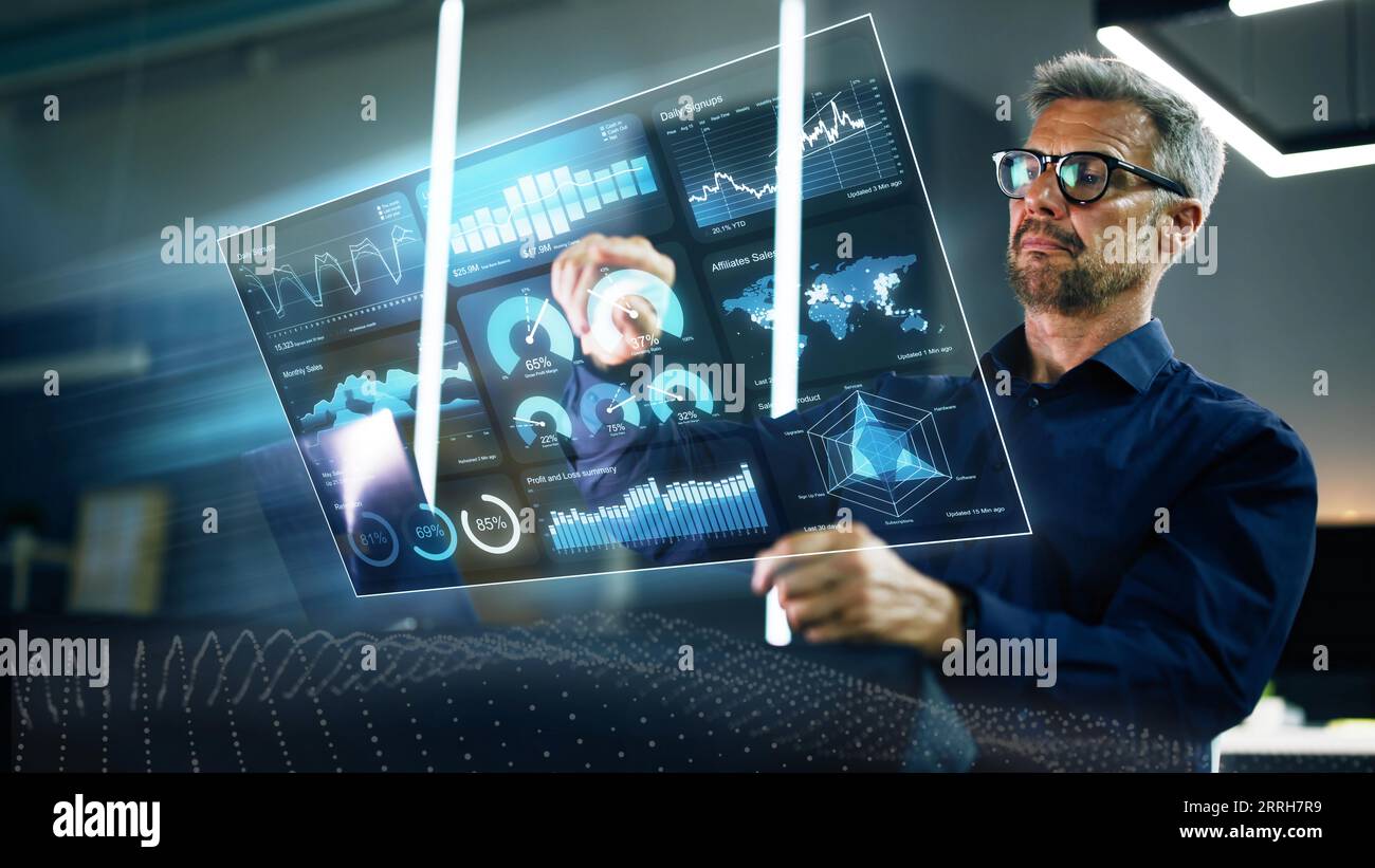 Financial Data Analyst Using KPI Dashboard Technology Stock Photo - Alamy