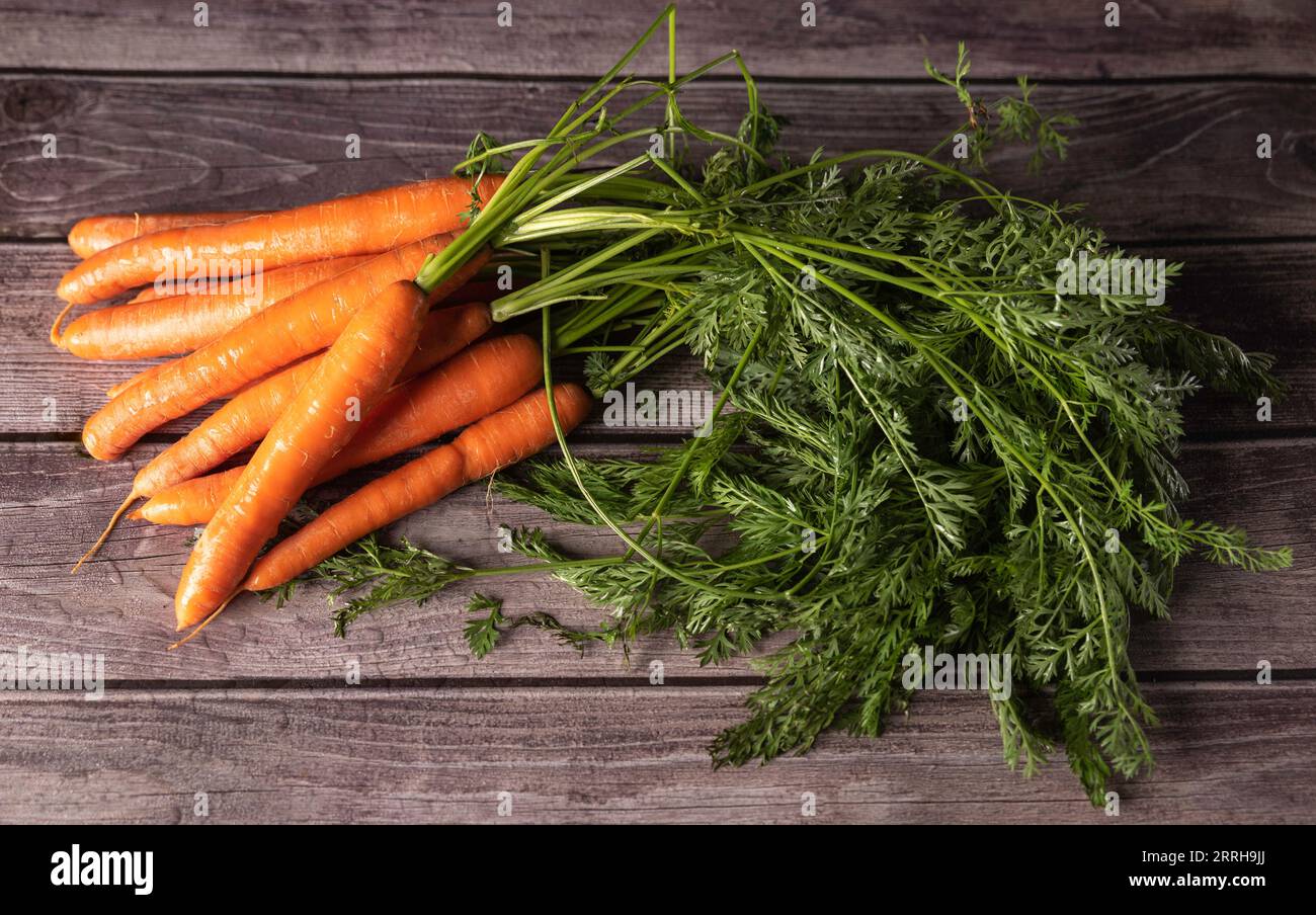Rustic carrots in basket hi-res stock photography and images - Alamy