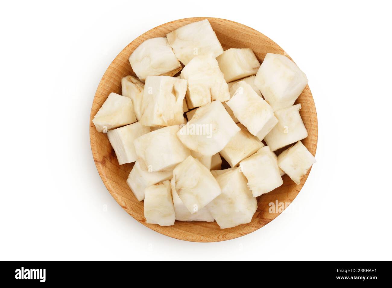 diced celery root in wooden bowl isolated on white background. Top view ...