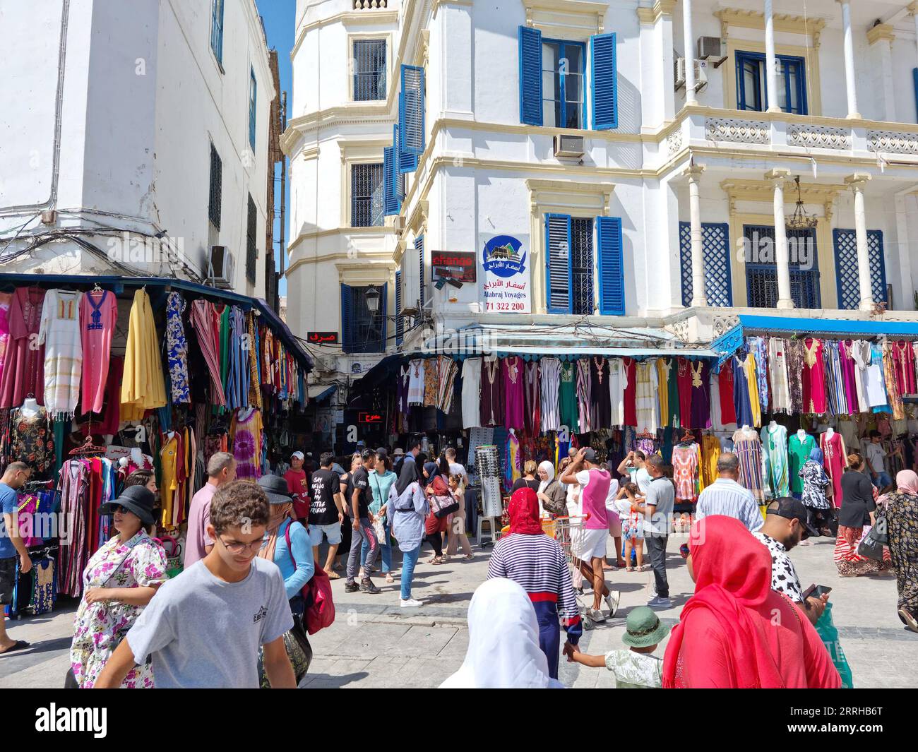 Tunis, Tunisia - 27 August, 2022: People walking in the medina quarter ...