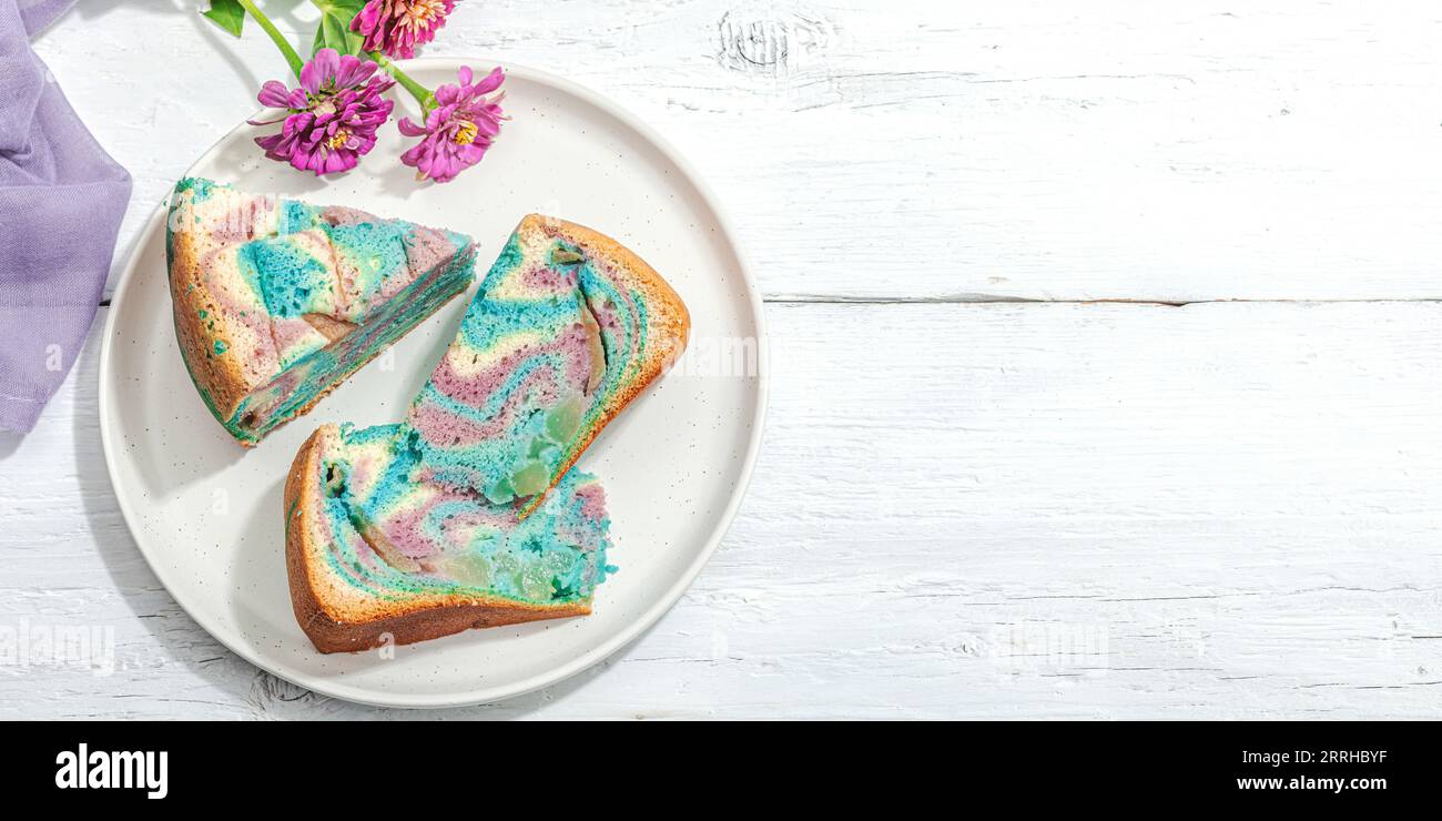 Apple pie in unicorn colors ready to eat. Homemade baking, nostalgic ...