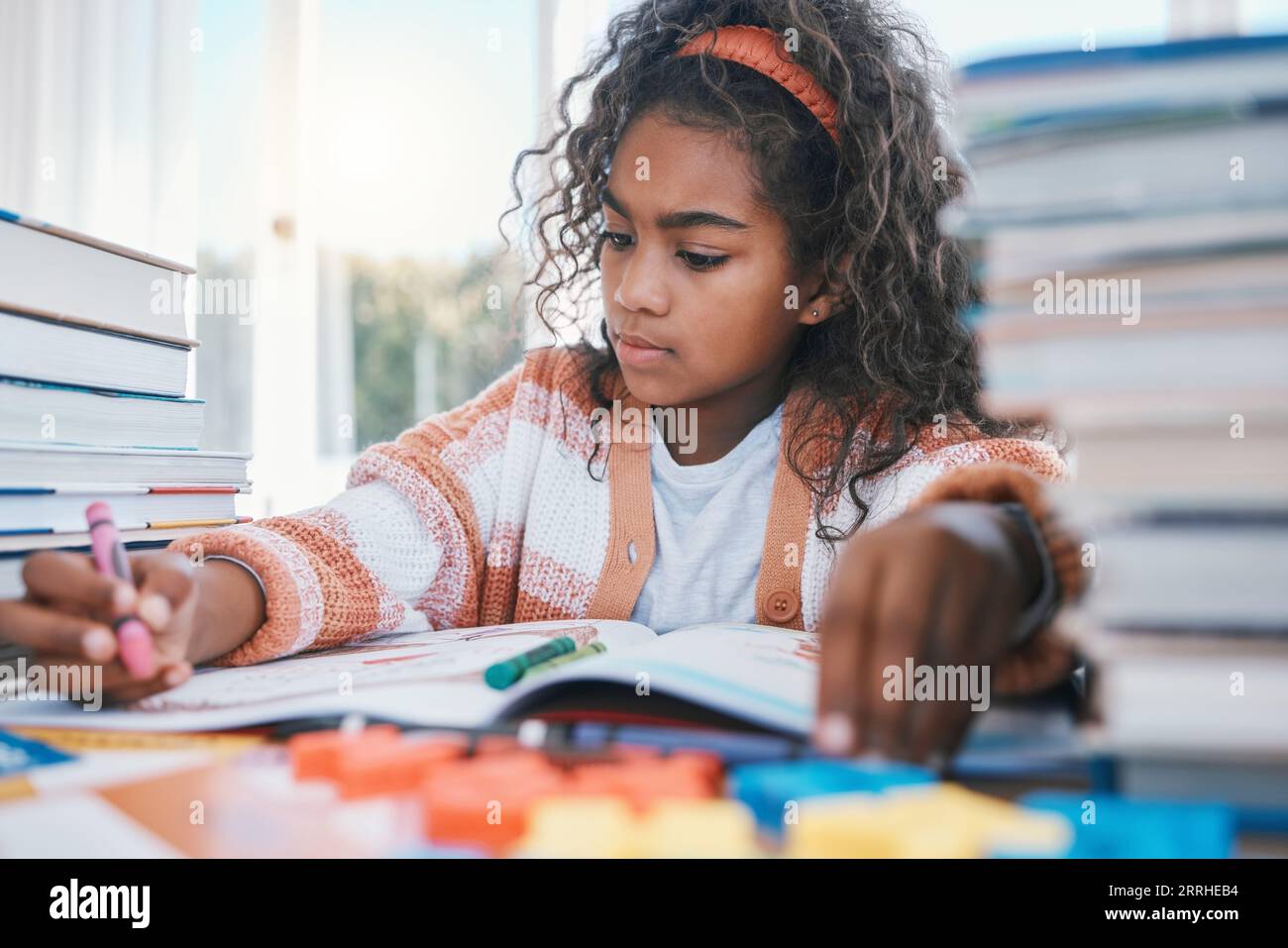 Art, homework and child coloring in a book for artistic project ...