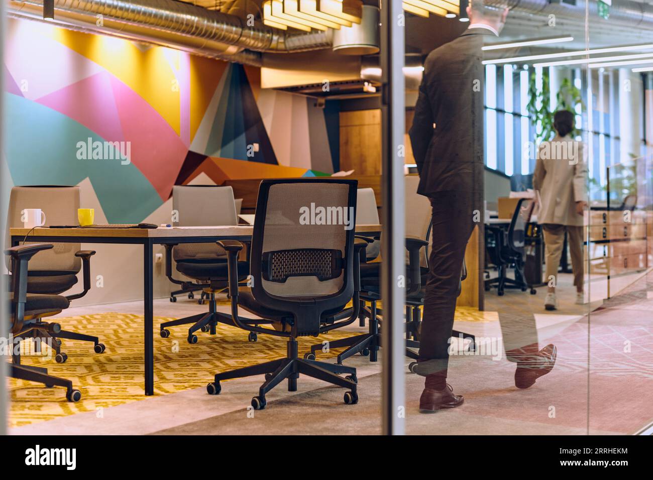 In the vibrant ambiance of a modern startup office, a diverse group of ...