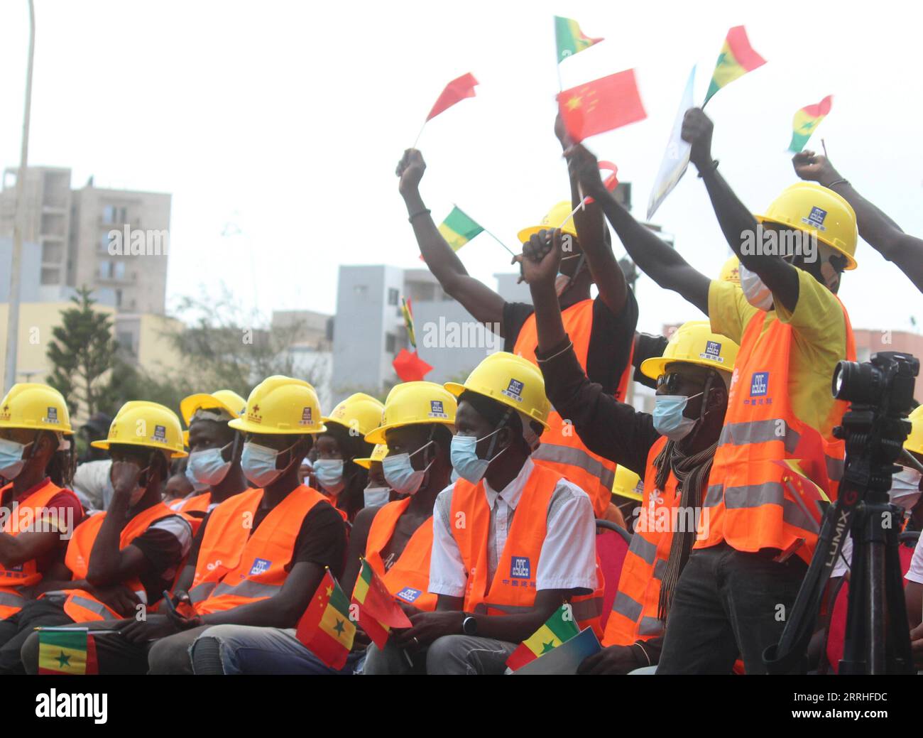 220629 -- DAKAR, June 29, 2022 -- Local employees participate in the ...