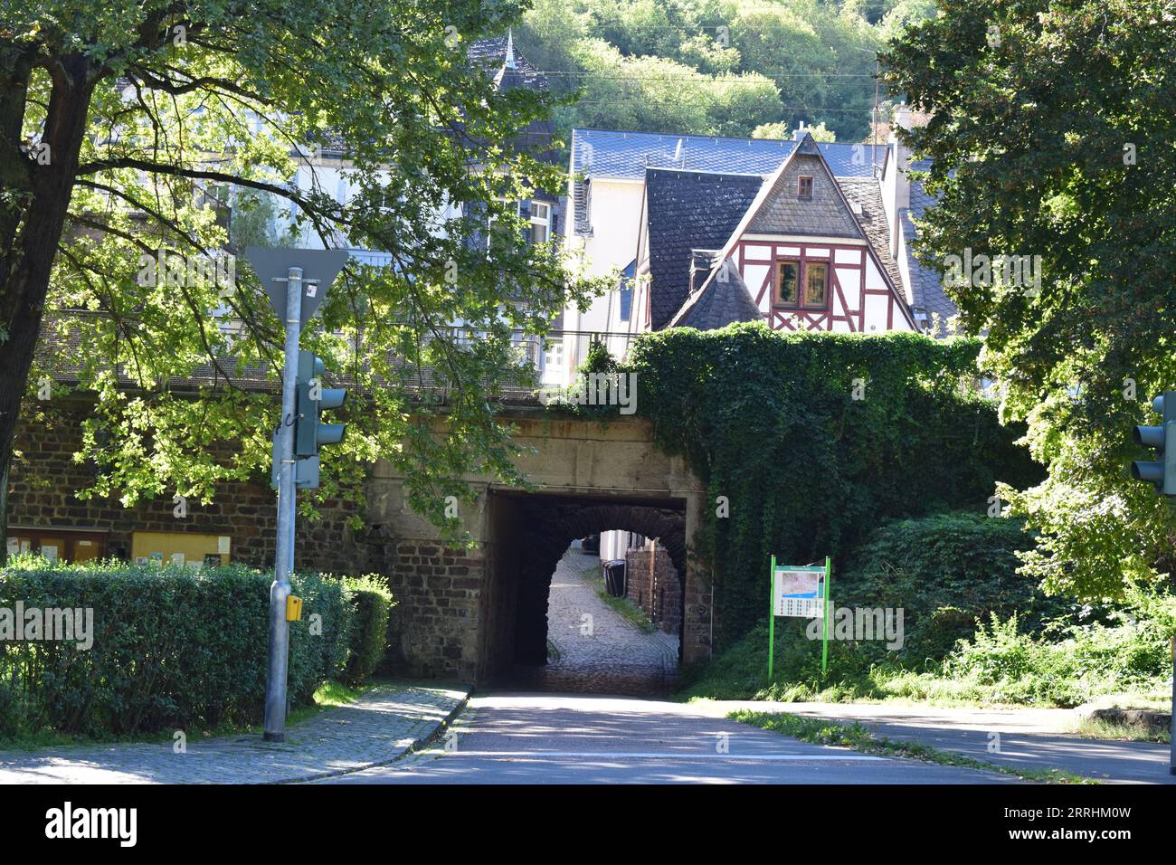 street through a city gate tower Stock Photo - Alamy