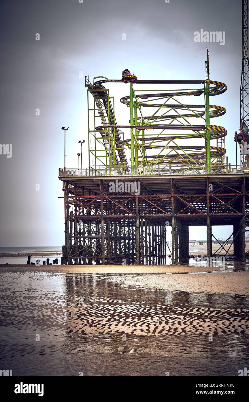 End of pier amusement ride at the end of summer Stock Photo - Alamy