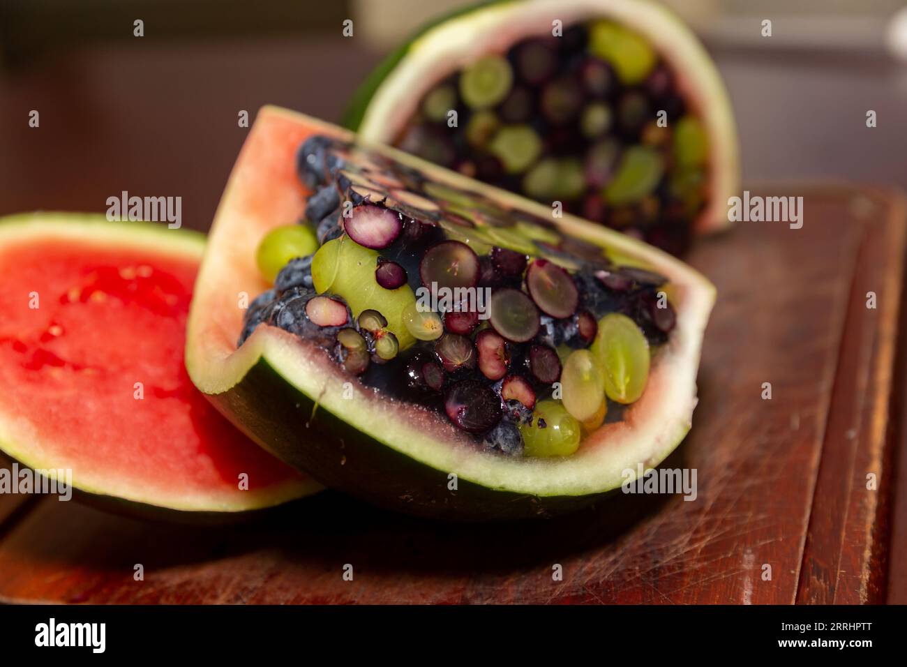 Opening a watermelon filled with gelatin and berries. Interesting and ...