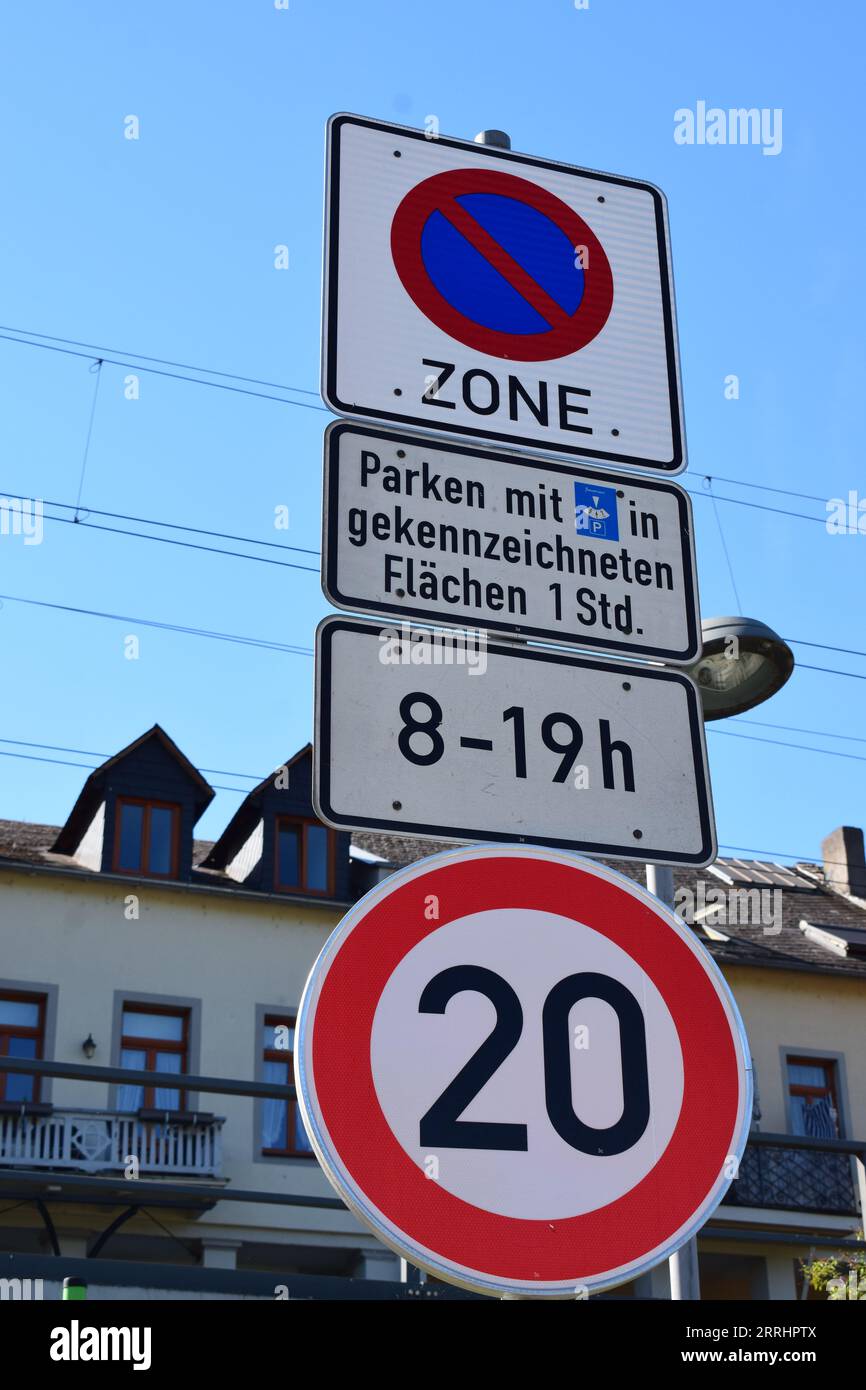 too many traffic signs at a German old town Stock Photo - Alamy