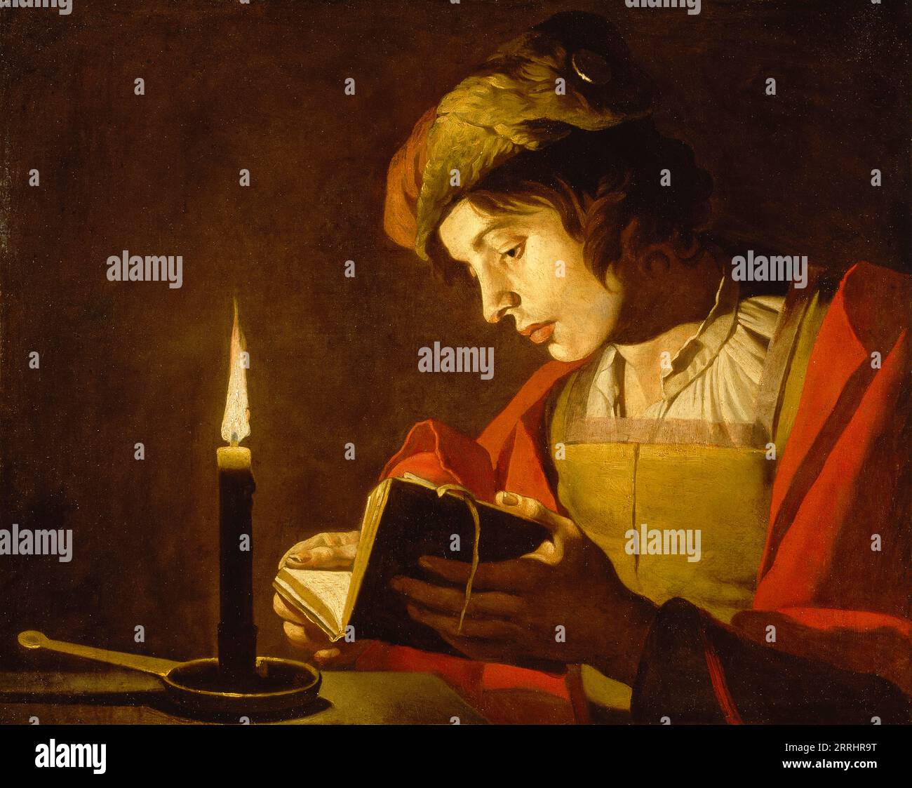 Reading by candlelight hi-res stock photography and images - Alamy