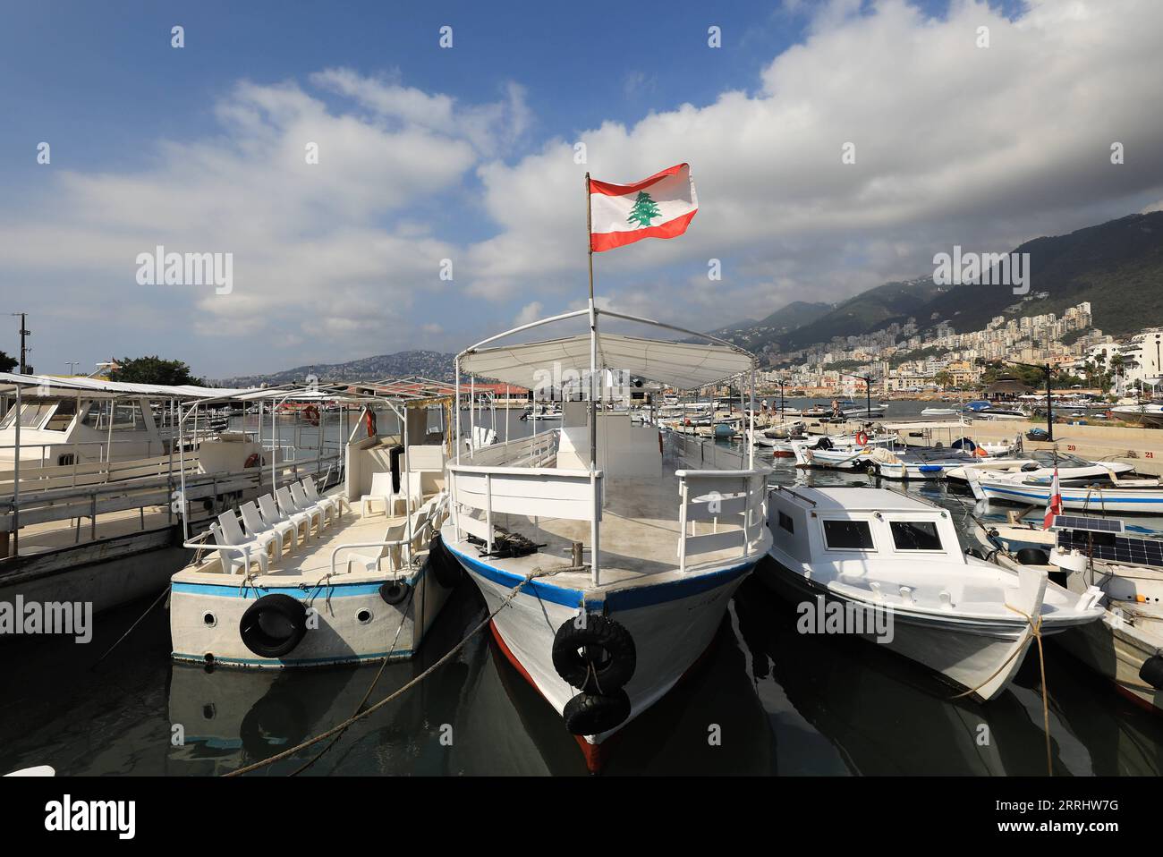 220707 -- JOUNIEH BAY LEBANON, July 7, 2022 -- Tourist boats are seen ...