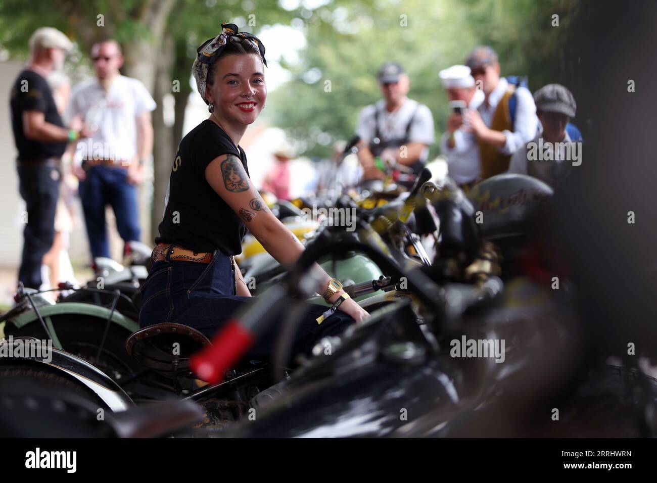 A member of The Hornets motorcycle group at the Goodwood Revival at the ...