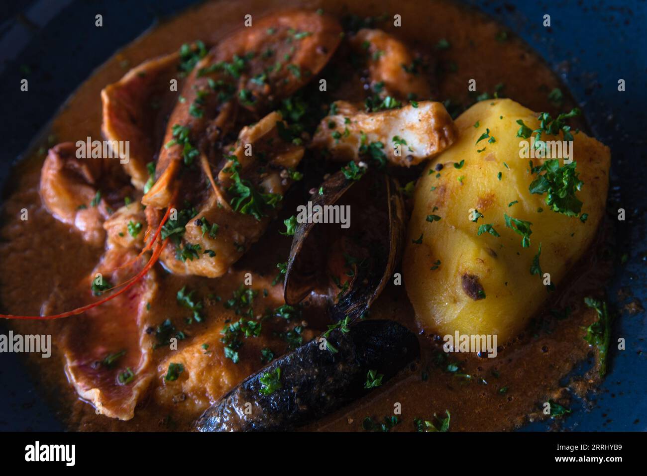 Traditional delicious bouillabaisse soup in seaside provencal ...