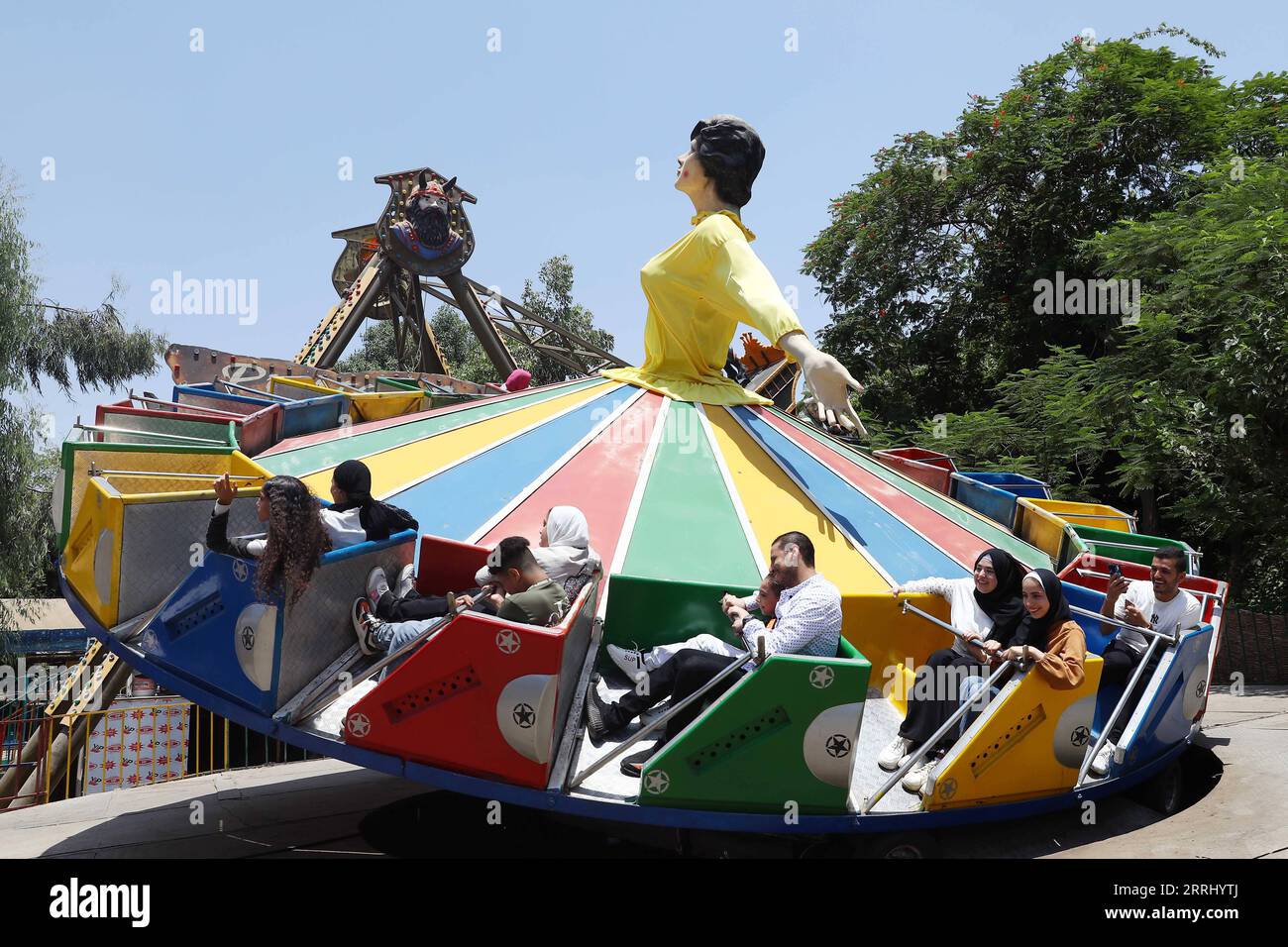 220710 -- GIZA, July 10, 2022 -- People enjoy themselves at a ...