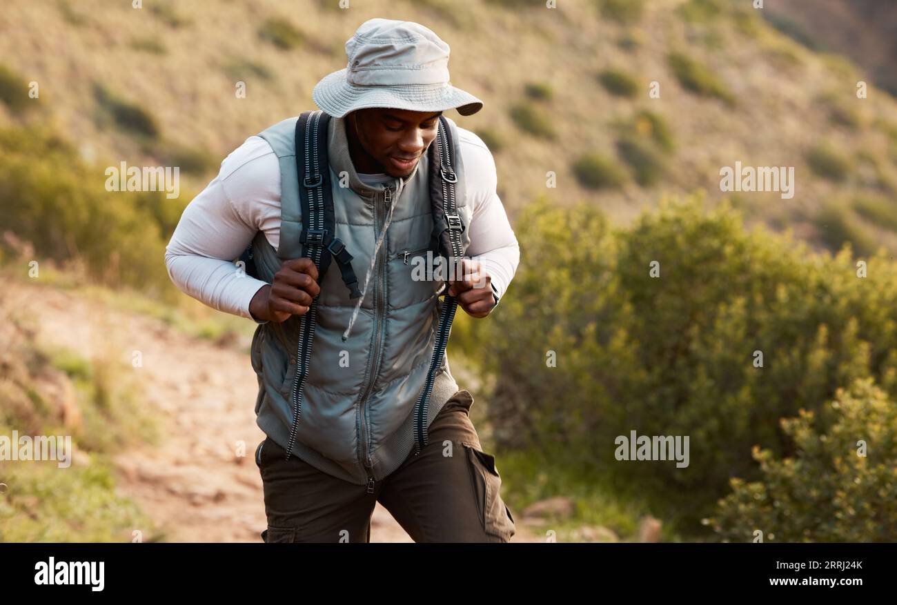 Black man, hiking and nature with travel and fitness outdoor, journey ...