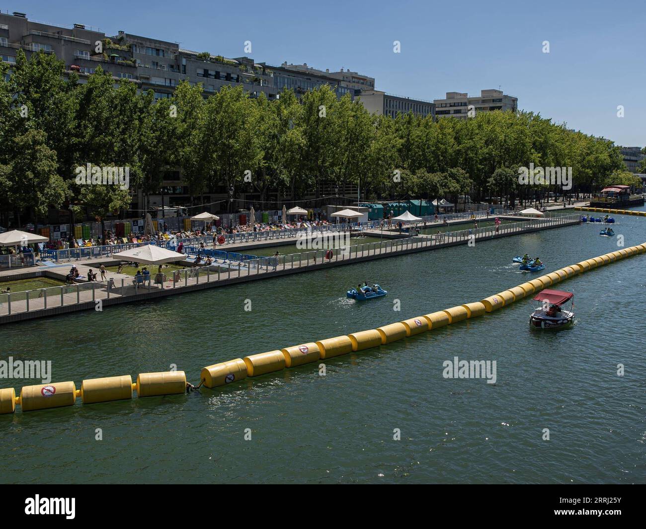 220712 -- PARIS, July 12, 2022 -- People enjoy the annual Paris Plages ...