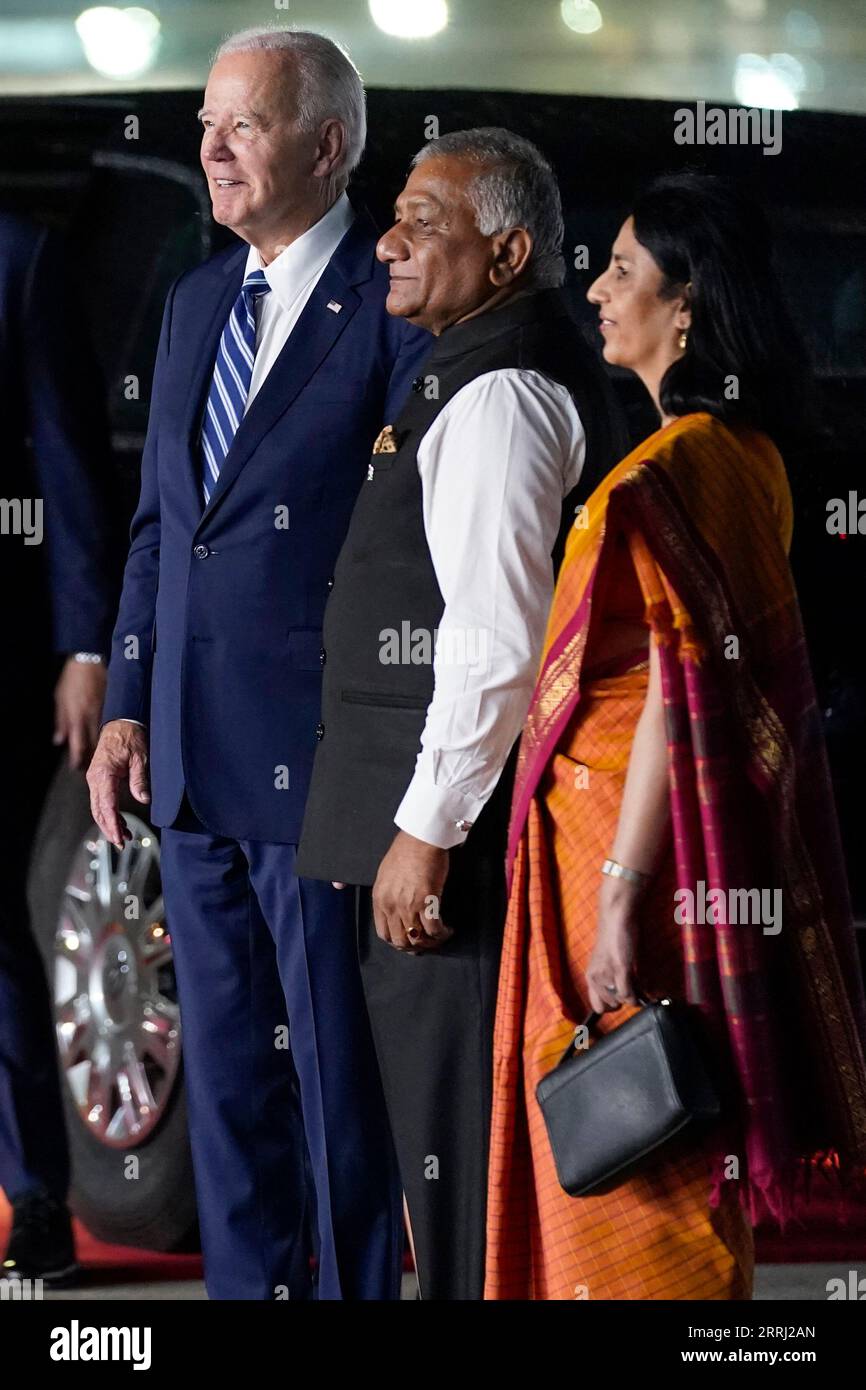 President Joe Biden watches a group of dancers with Vani Sarraju Rao ...