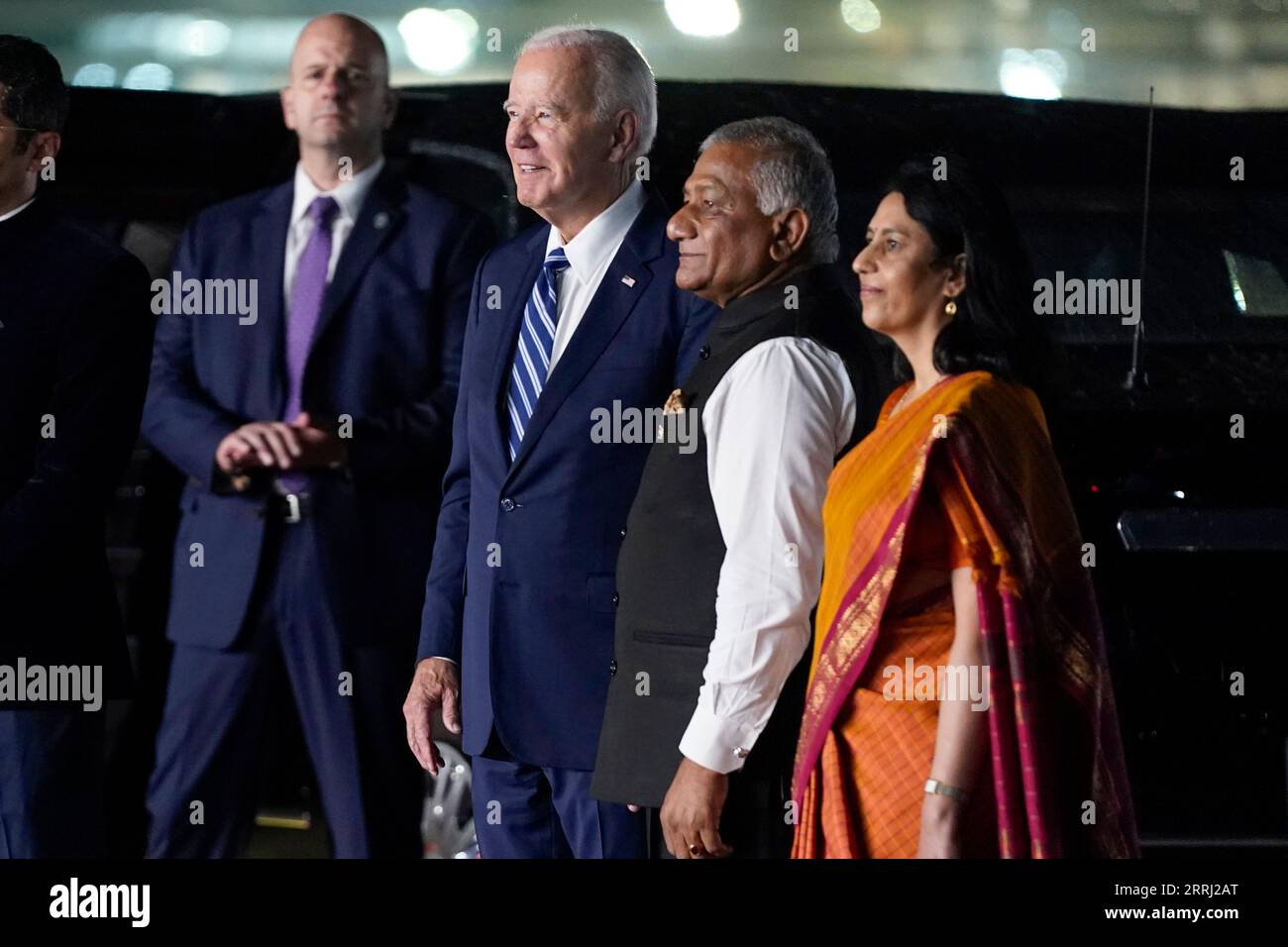 President Joe Biden watches a group of dancers with Vani Sarraju Rao ...