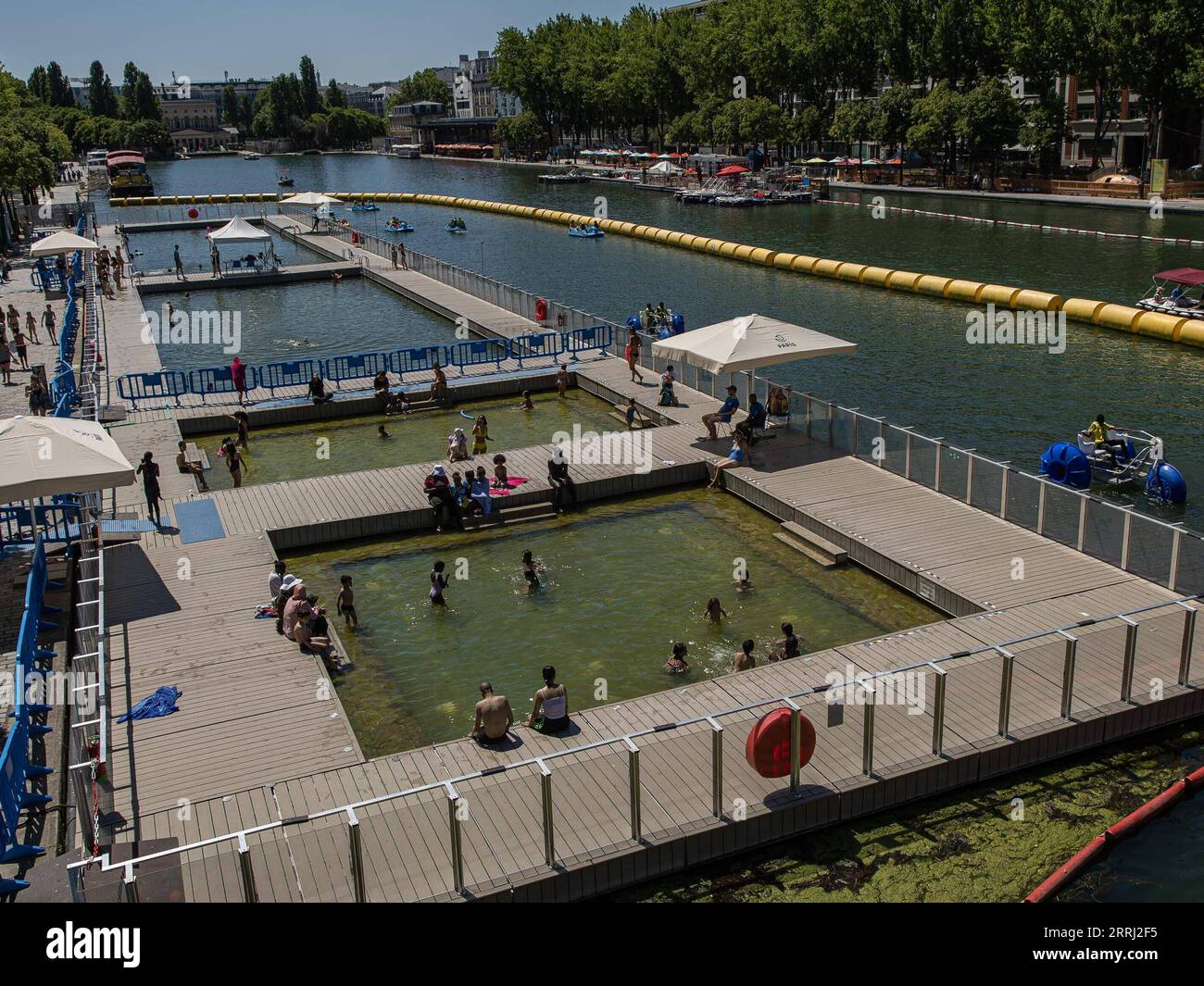 220712 -- PARIS, July 12, 2022 -- People enjoy the annual Paris Plages ...