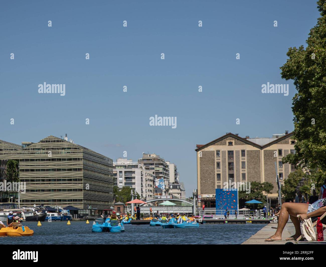 220712 -- PARIS, July 12, 2022 -- People enjoy the annual Paris Plages ...