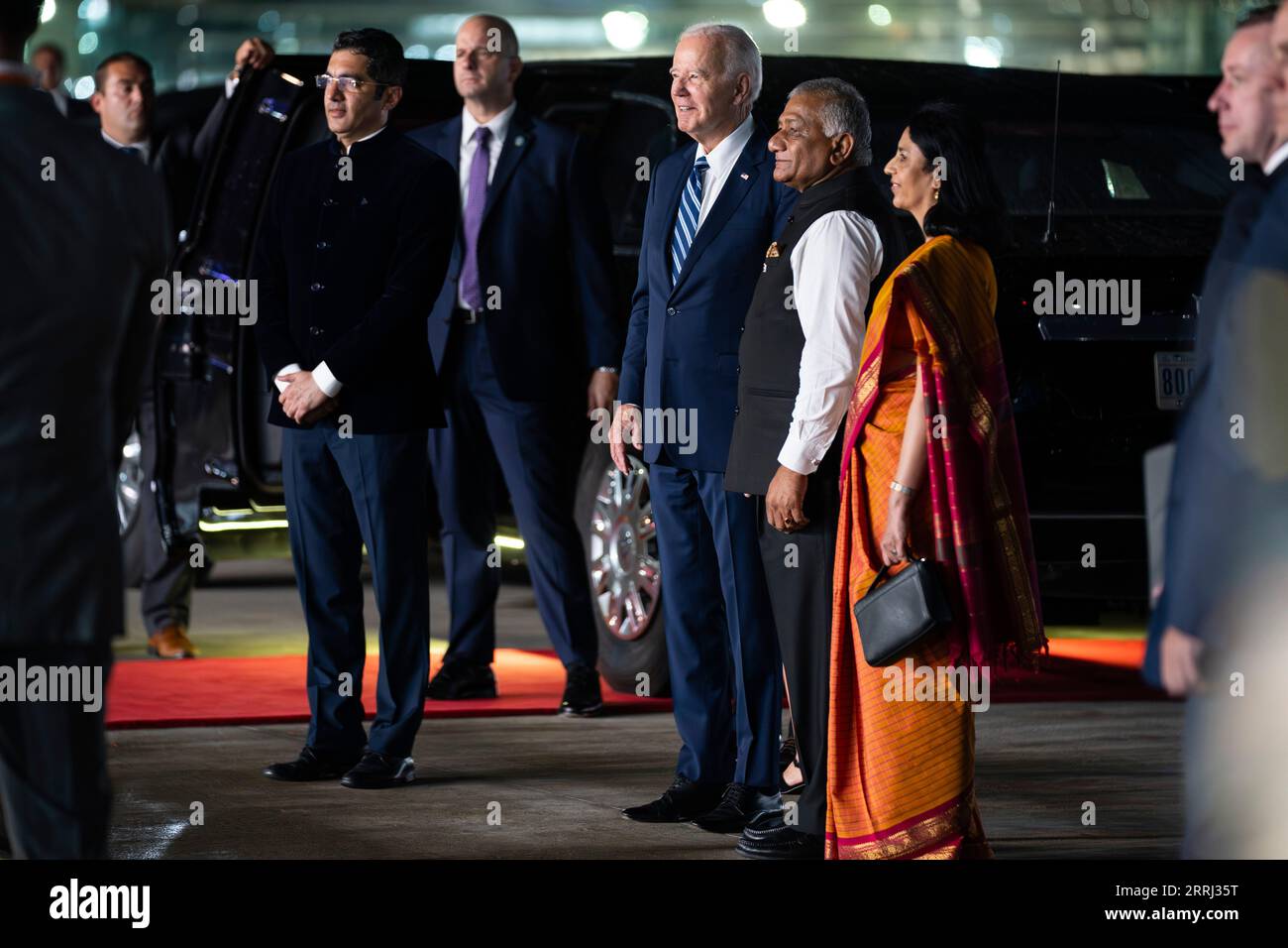 President Joe Biden watches a group of dancers with Vani Sarraju Rao ...