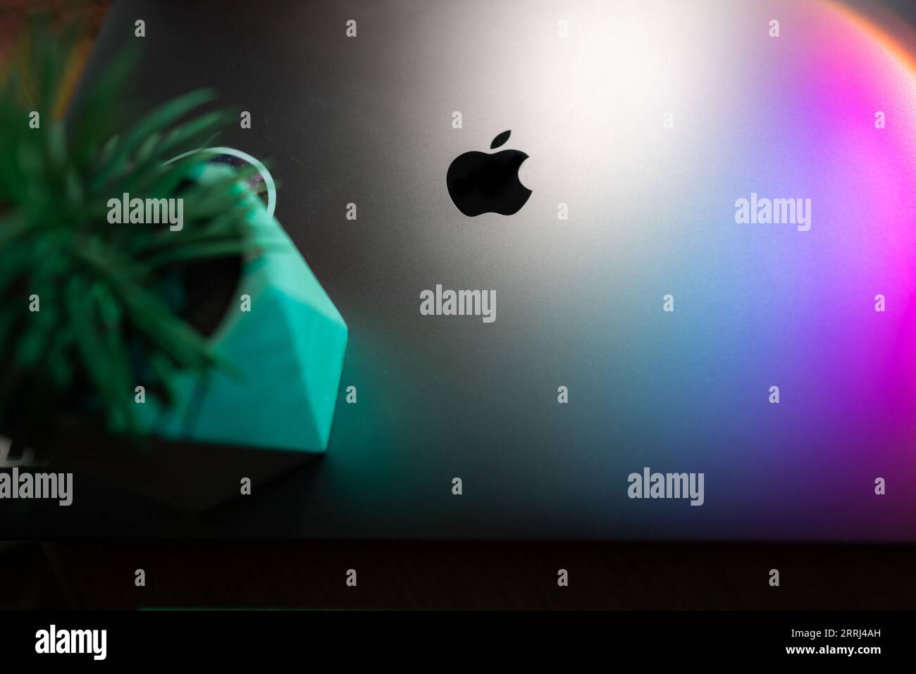 Laptop back with colorful lights - Apple Macbook pro computer Stock ...