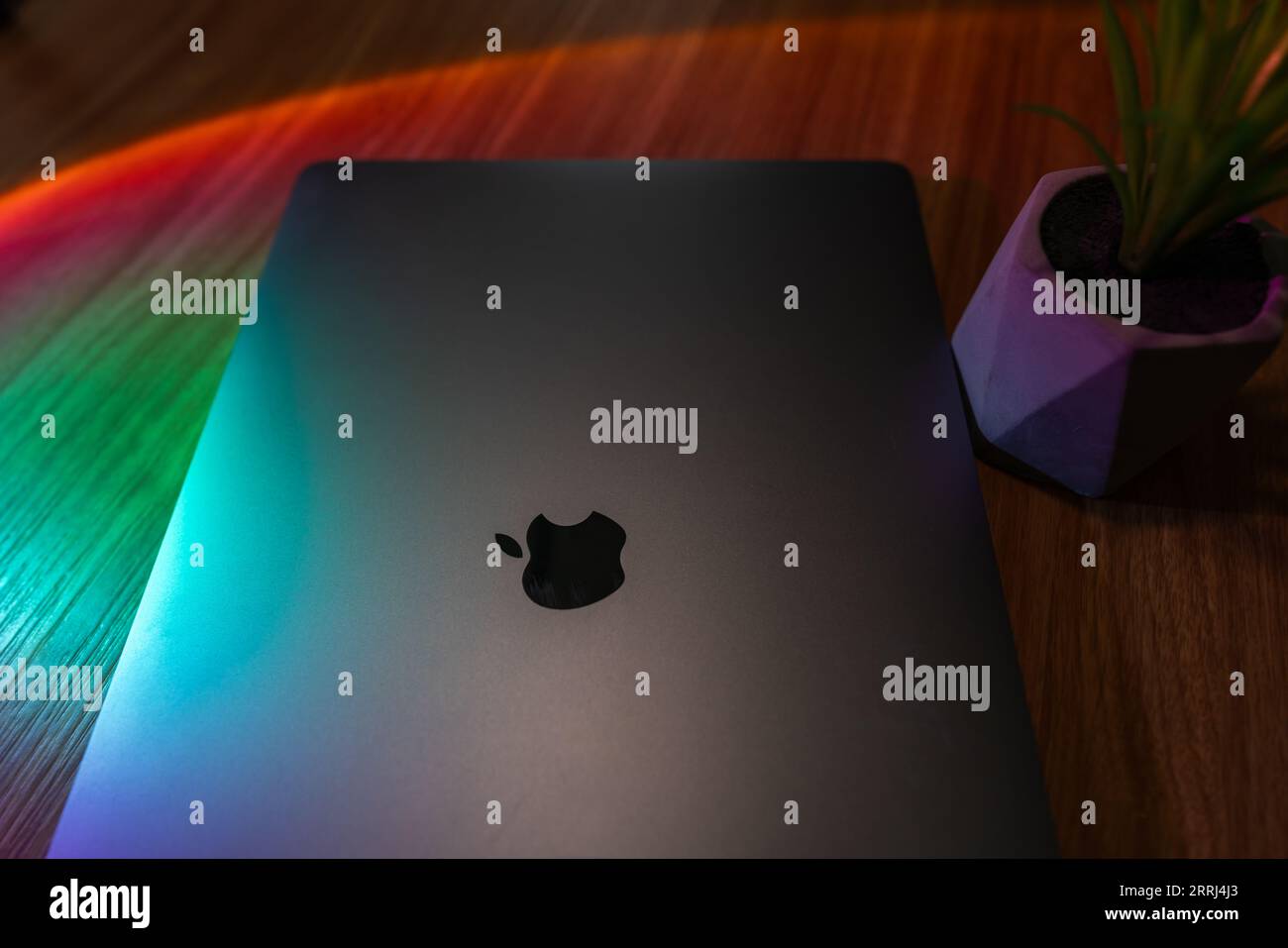 Laptop back with colorful lights - Apple Macbook pro computer Stock ...