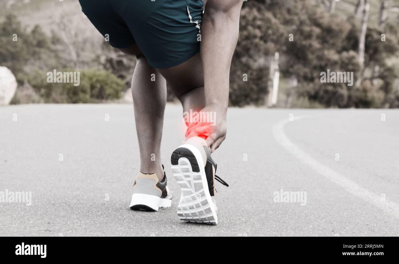 Injured runner athlete race hi-res stock photography and images - Alamy