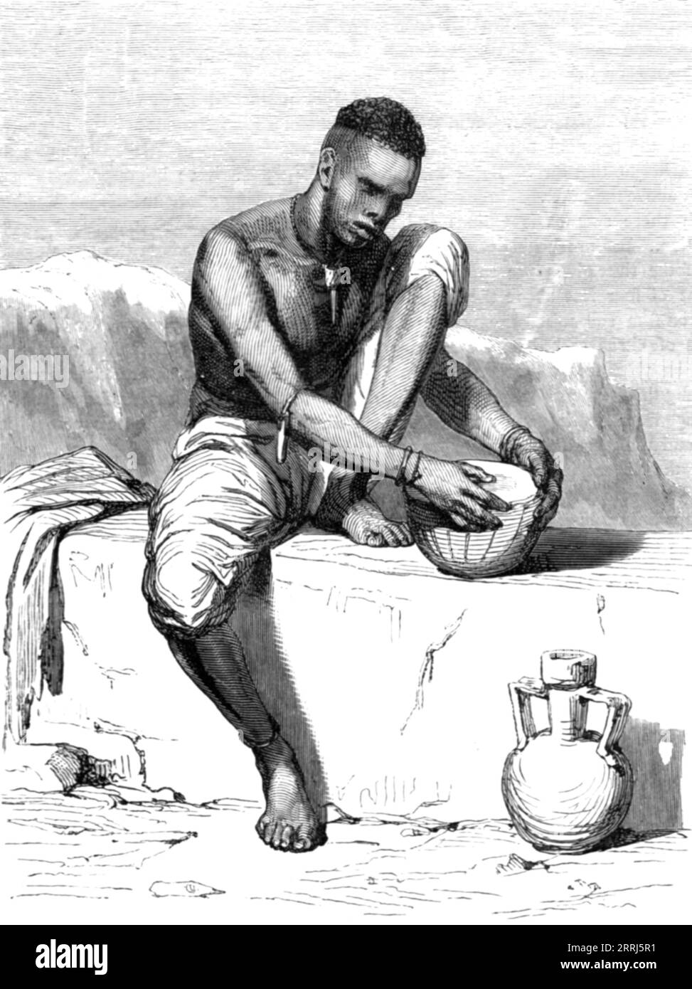 'Native of the Dinka tribe,white Nile, mending his drum; The Nile ...