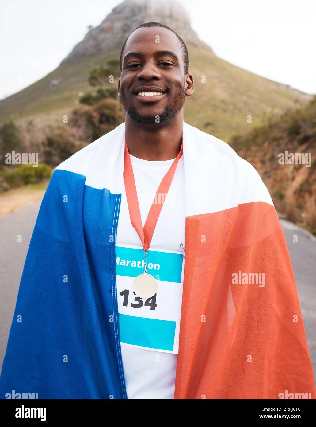 Black runner with medal hi-res stock photography and images - Alamy