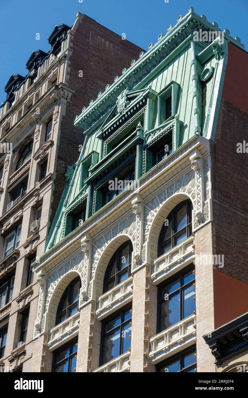 SoHo is an historic district in New York City featuring cast iron ...