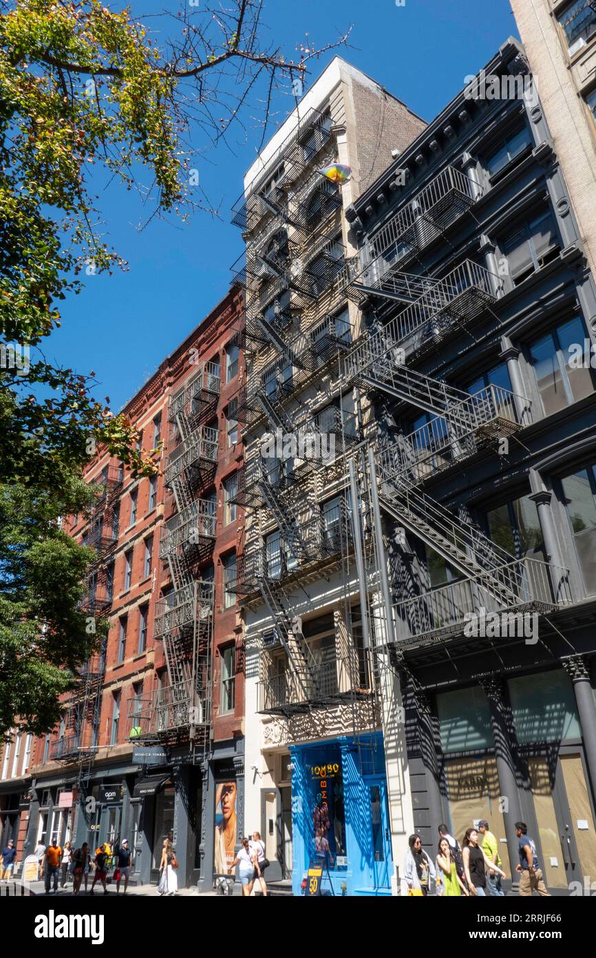 SoHo is an historic district in New York City featuring cast iron ...