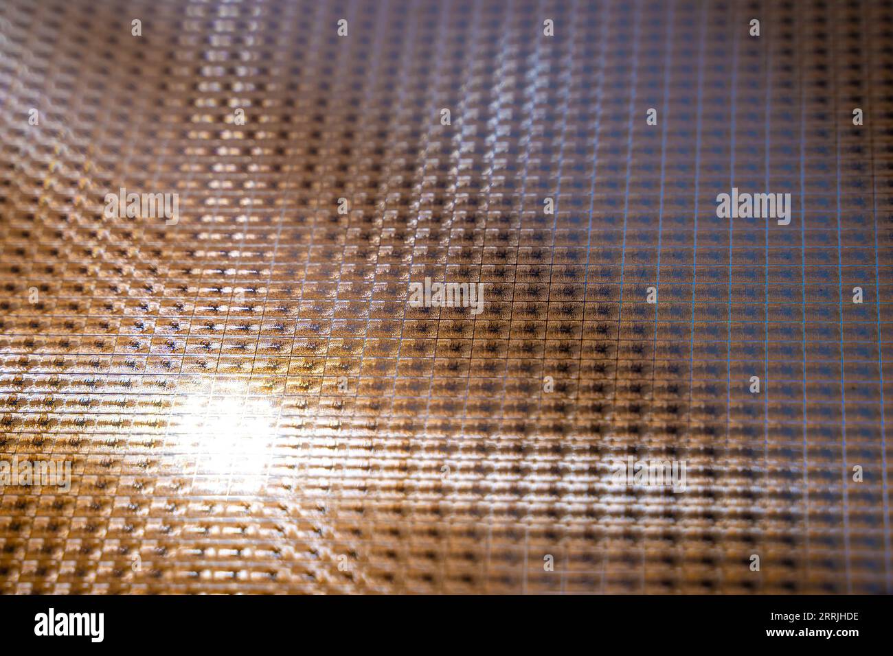 detailed pattern of wafers disc with light flares. chip industry and ...