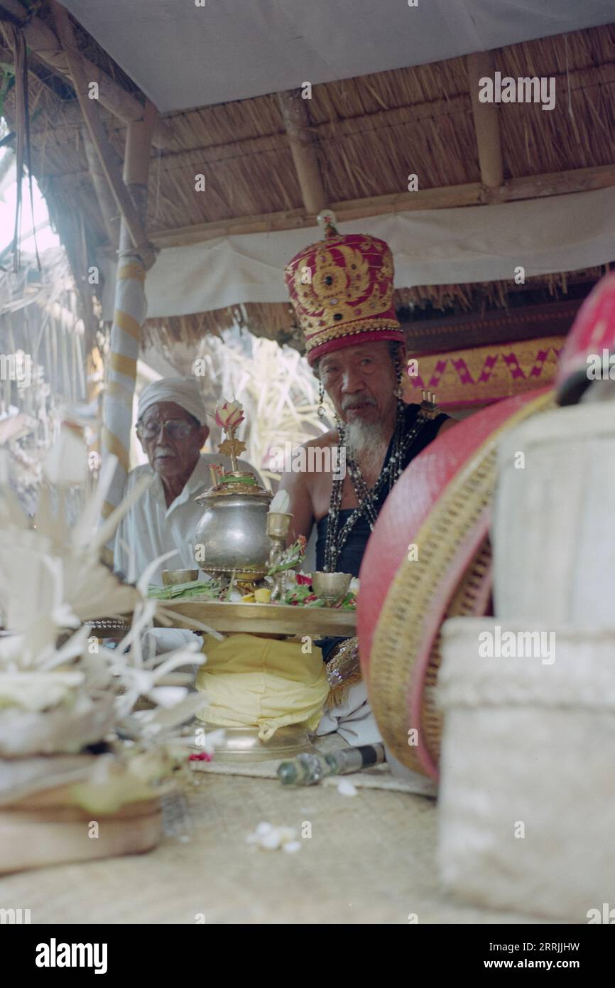 Balinese ceremony master at the temple wearing a golden crown Stock ...