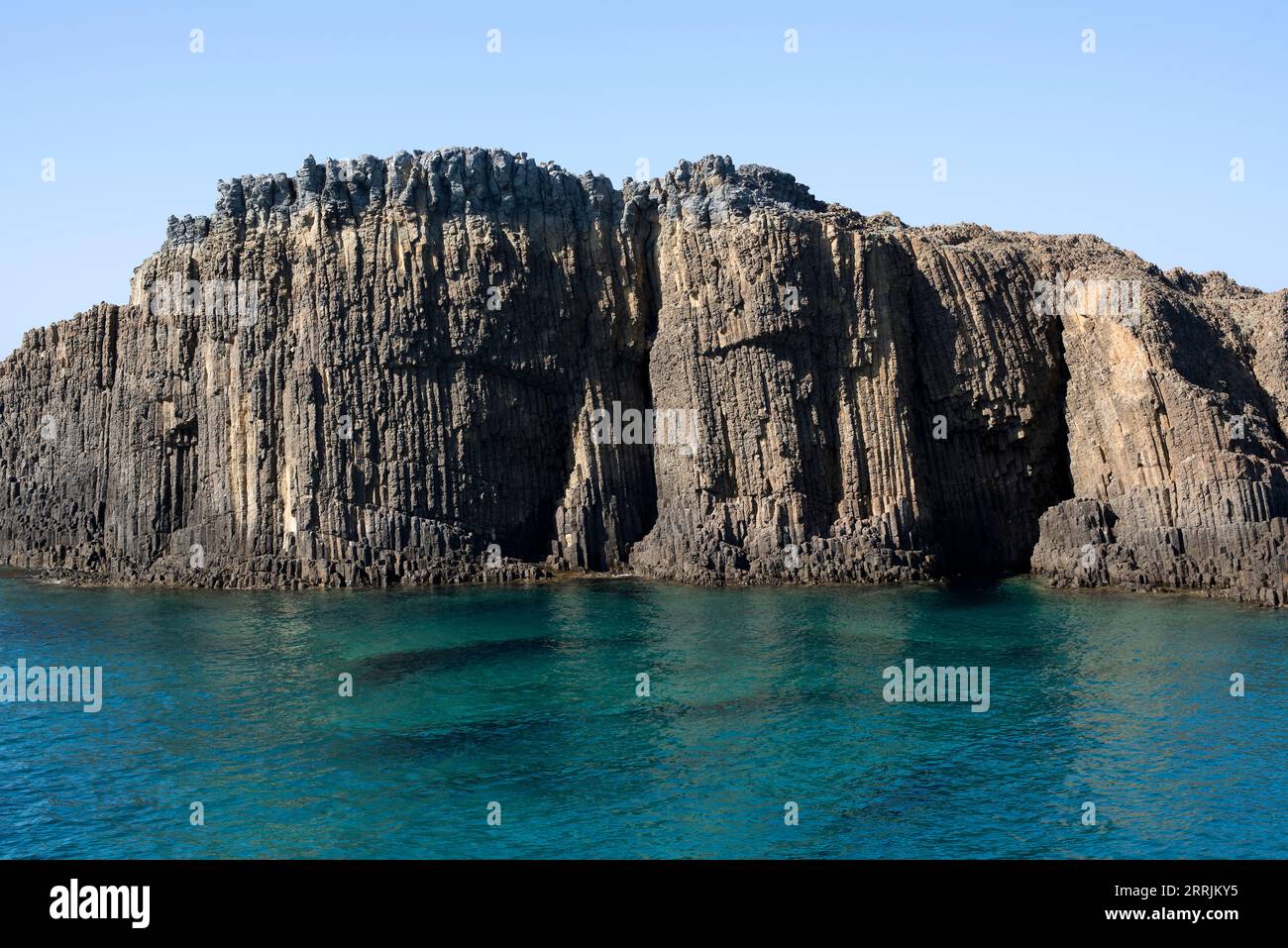 Columnar basalt. Basalt is an extrusive igneous rock. This photo was ...