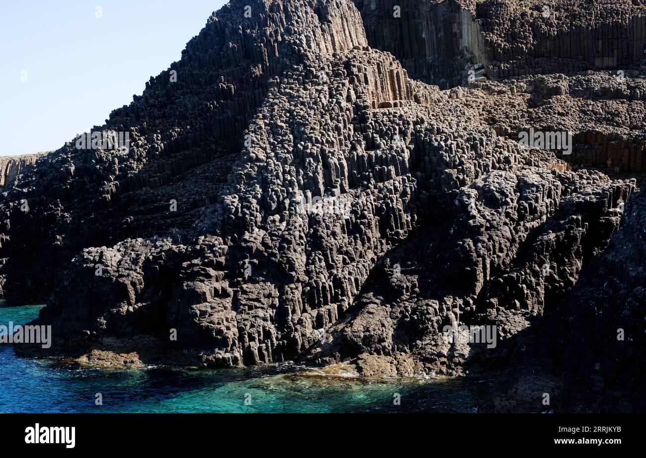 Columnar basalt. Basalt is an extrusive igneous rock. This photo was ...