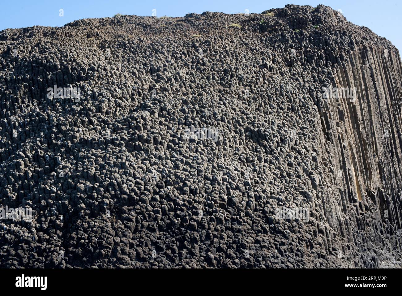 Columnar basalt. Basalt is an extrusive igneous rock. This photo was ...
