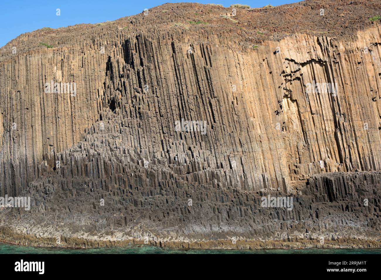 Columnar basalt. Basalt is an extrusive igneous rock. This photo was ...