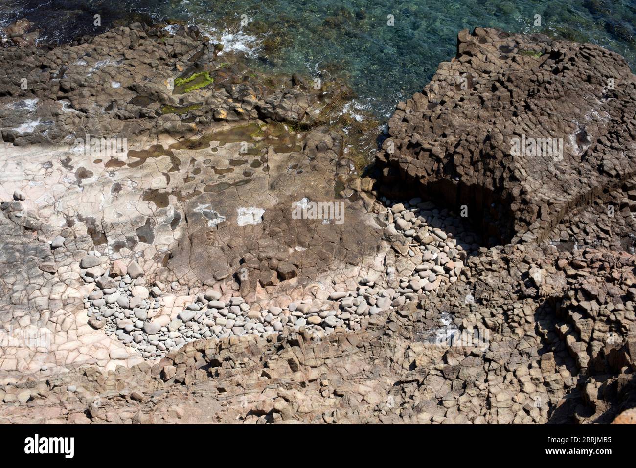 Dacite is an extrusive igneous rock. This photo was taken on Cabo de ...