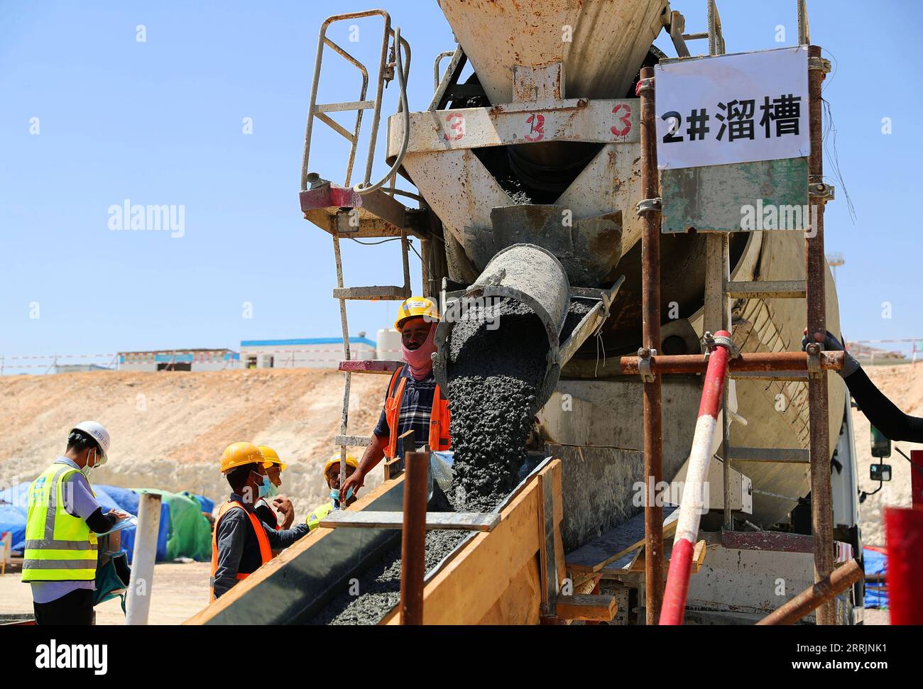 220801 -- NEW ALAMEIN, Aug. 1, 2022 -- Workers operate at the ...