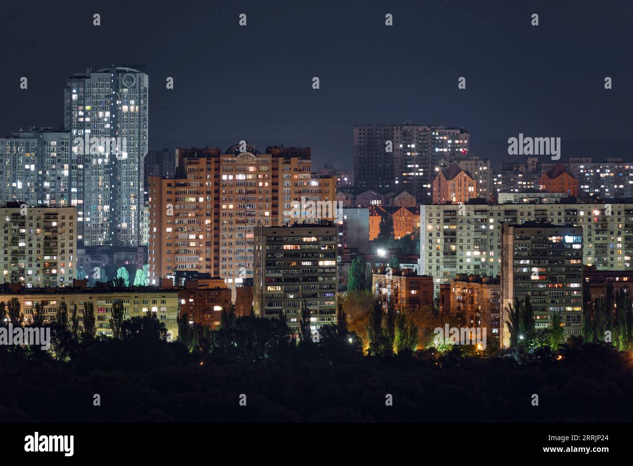 2023-09-01 Kyiv, Ukraine. High rise residential districts at night on the left bank of Dnipro ...