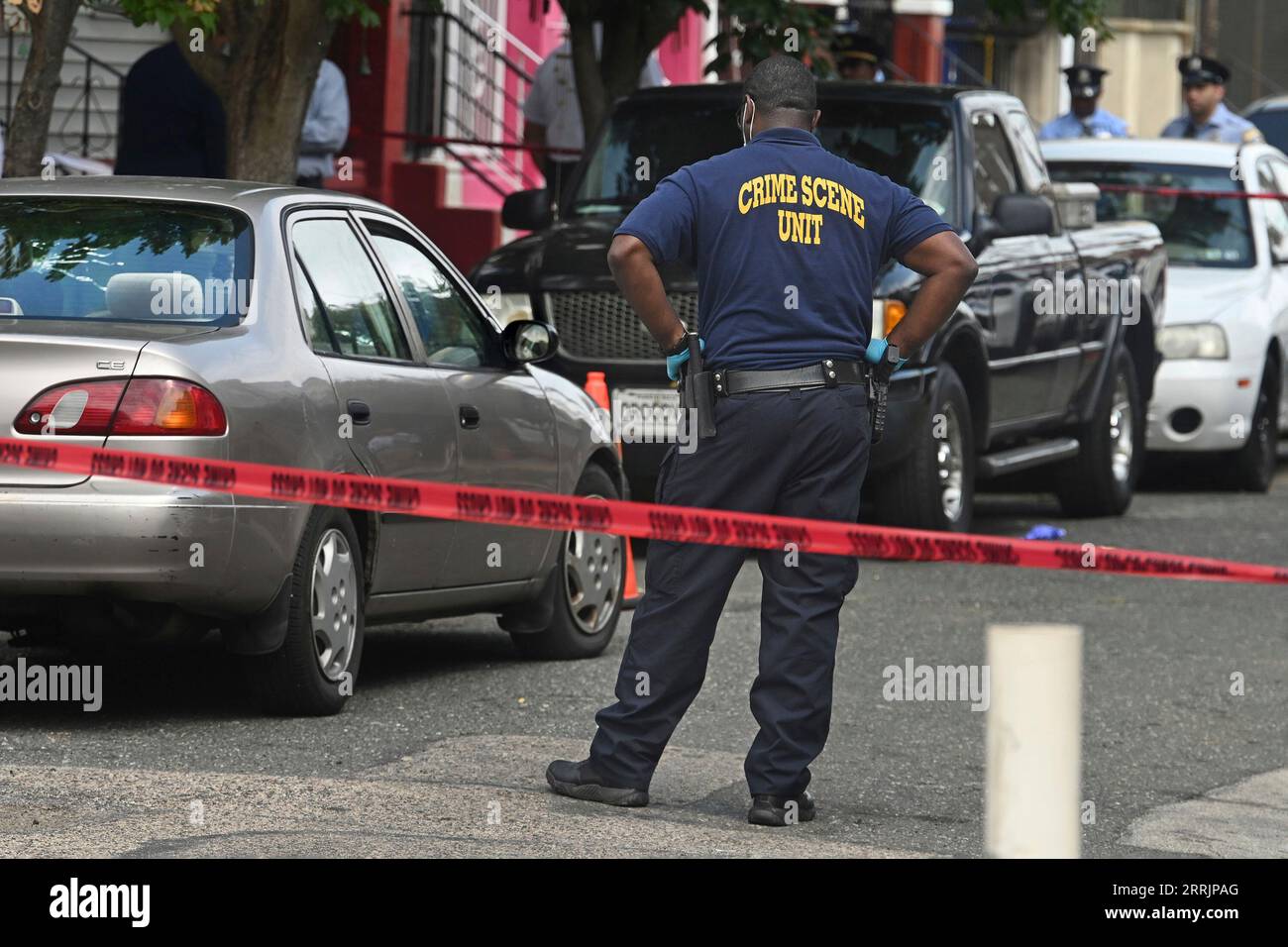 FILE - Police investigators are on the scene of a shooting Monday, Aug ...